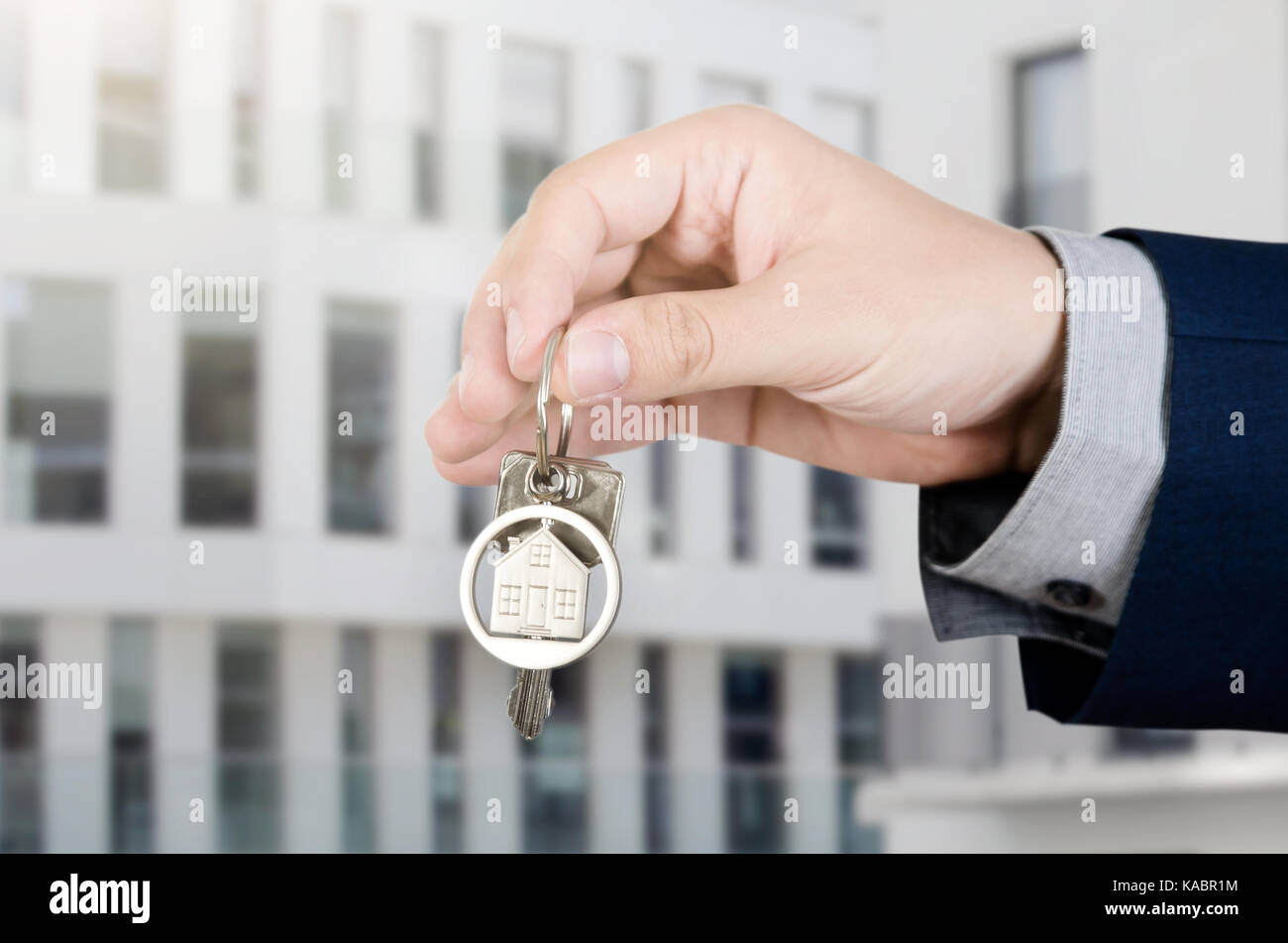 Real estate agent with home keys. realestate key apartment real estate ...