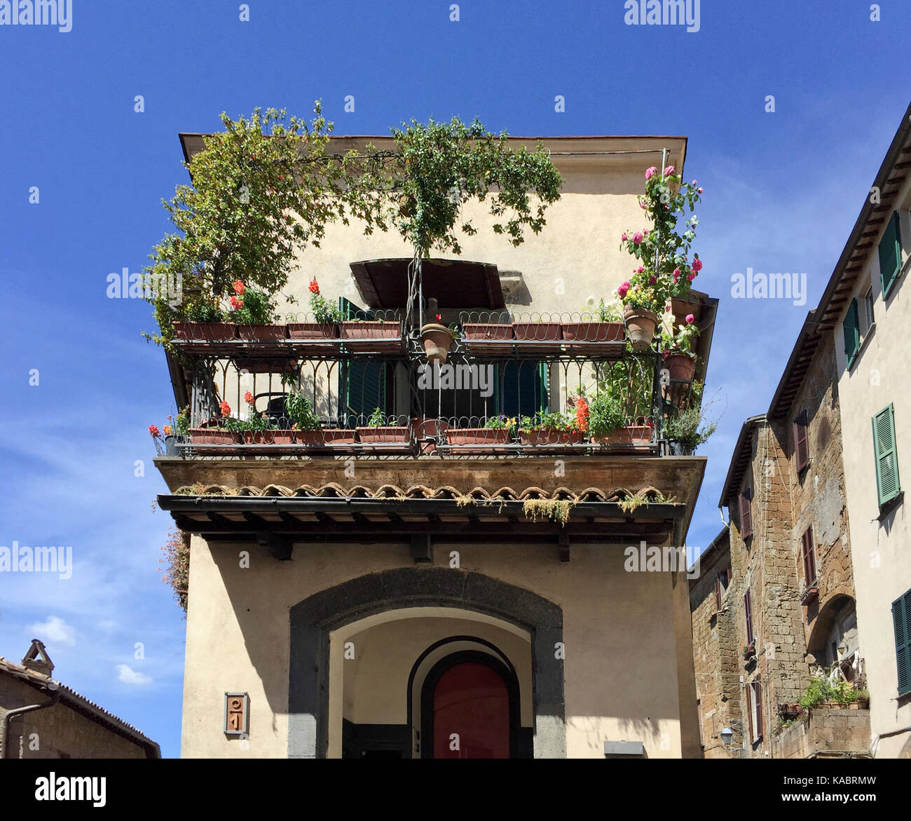 Two story house with balcony in Orvieto, Italy, 2017 Stock Photo - Alamy