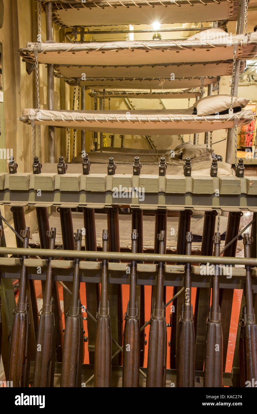 Rows of beds and rifles inside WWII Liberty Ship troop transporter ...
