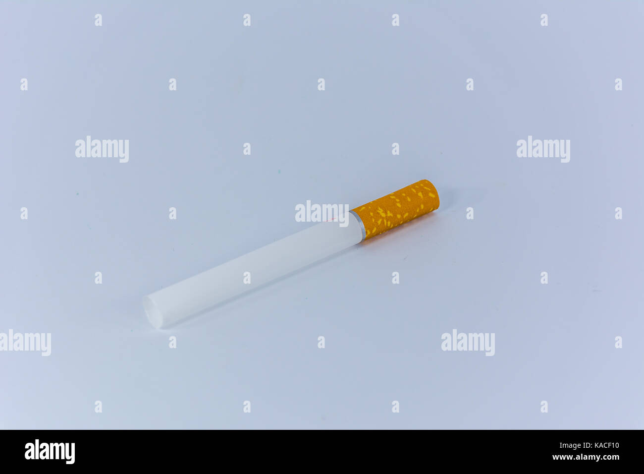 Empty cigarette tube Stock Photo - Alamy