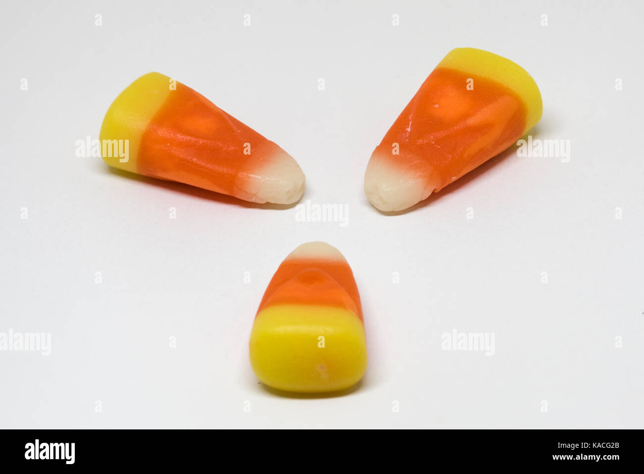 Three Pieces of Candy Corn Stock Photo - Alamy
