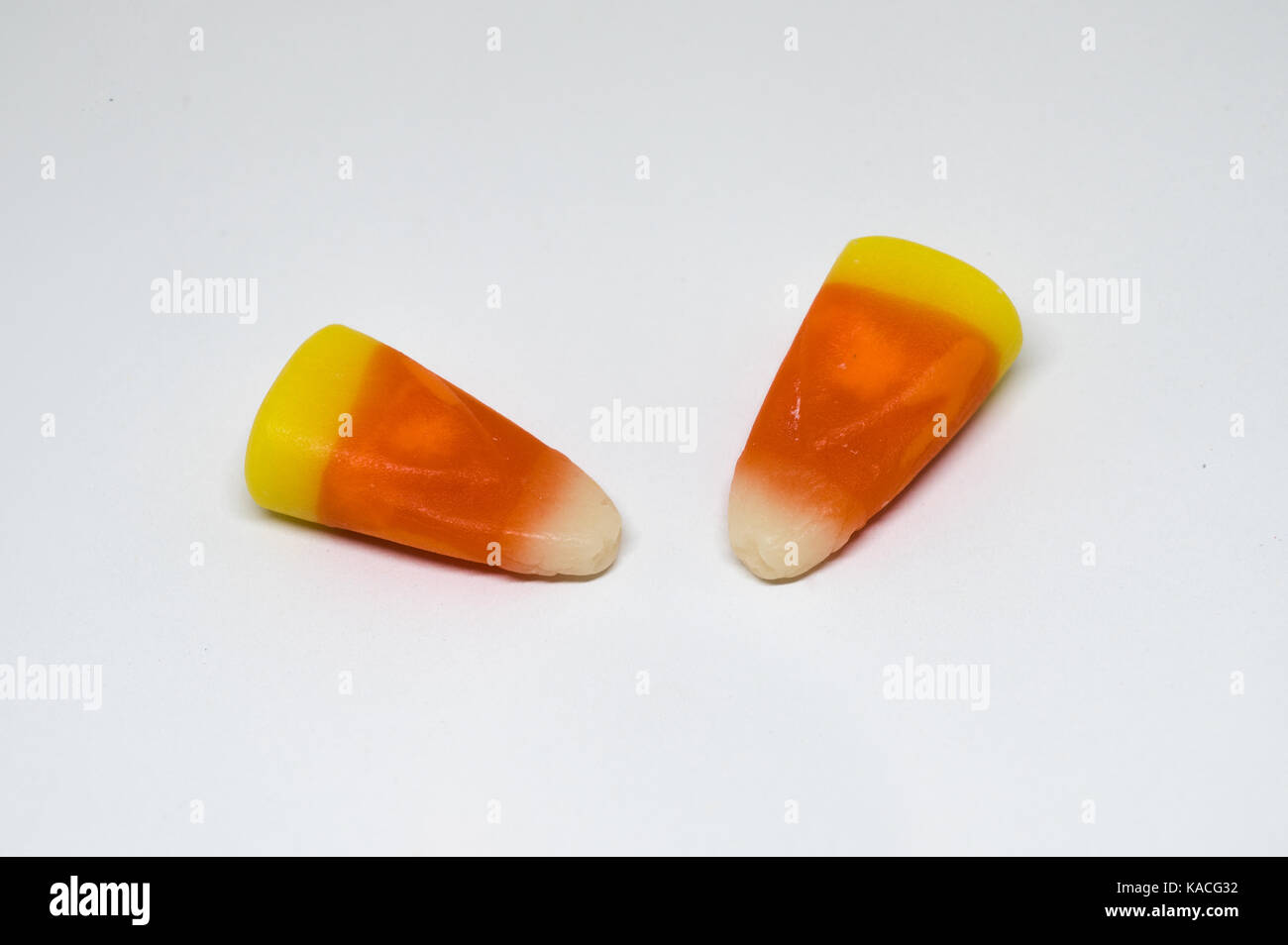 Two Brightly Colored Candy Corn Pieces Stock Photo - Alamy