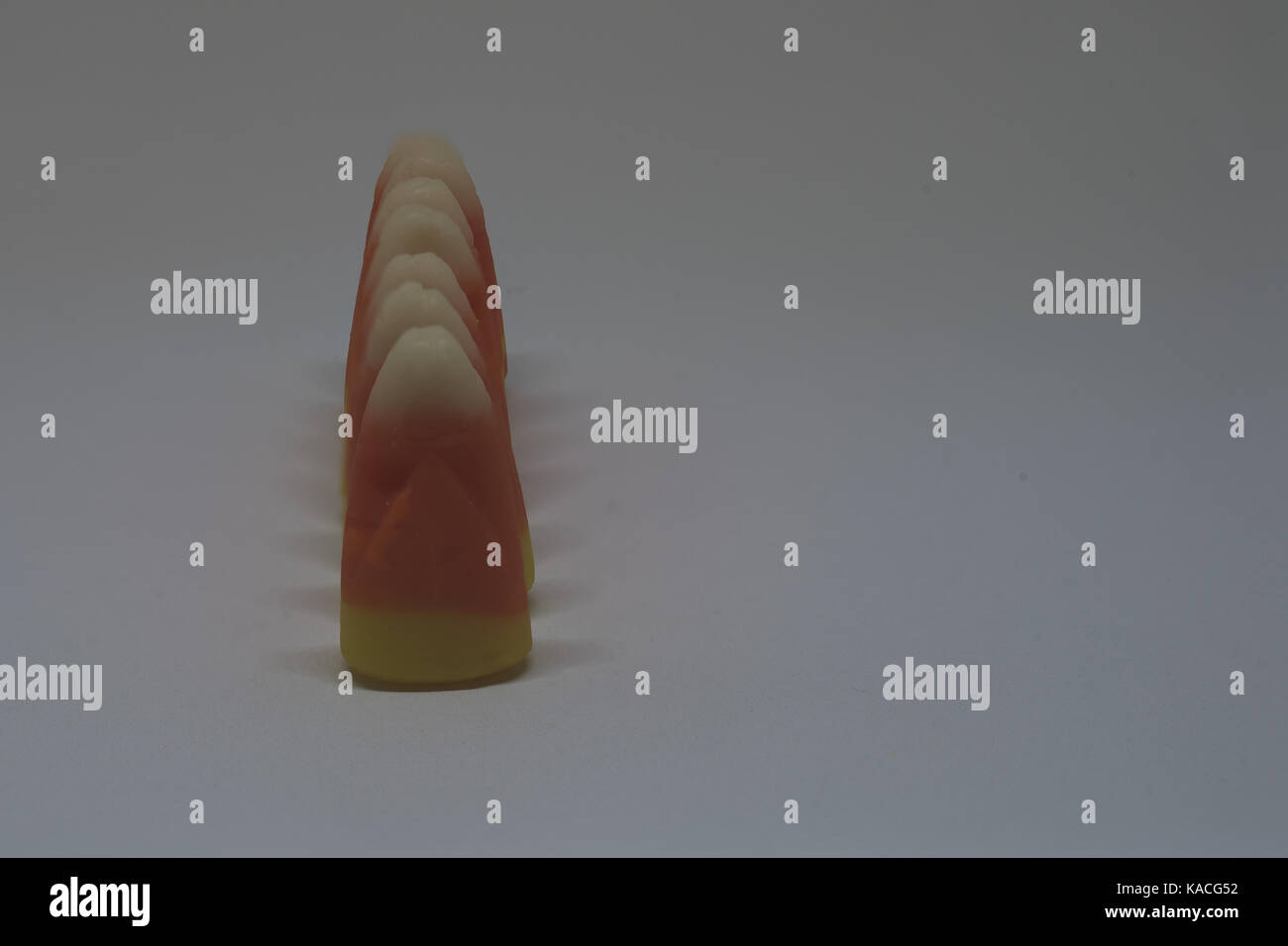 Candy Corn Standing in a Row Stock Photo - Alamy