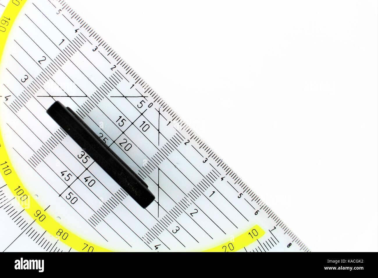 An image of a triangle ruler and a pen - office, school Stock Photo - Alamy