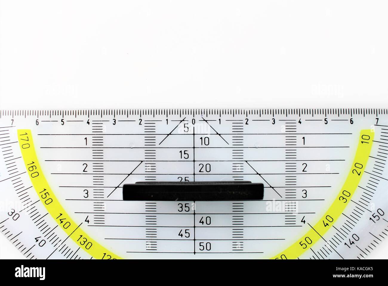 An image of a triangle ruler and a pen - office, school Stock Photo - Alamy
