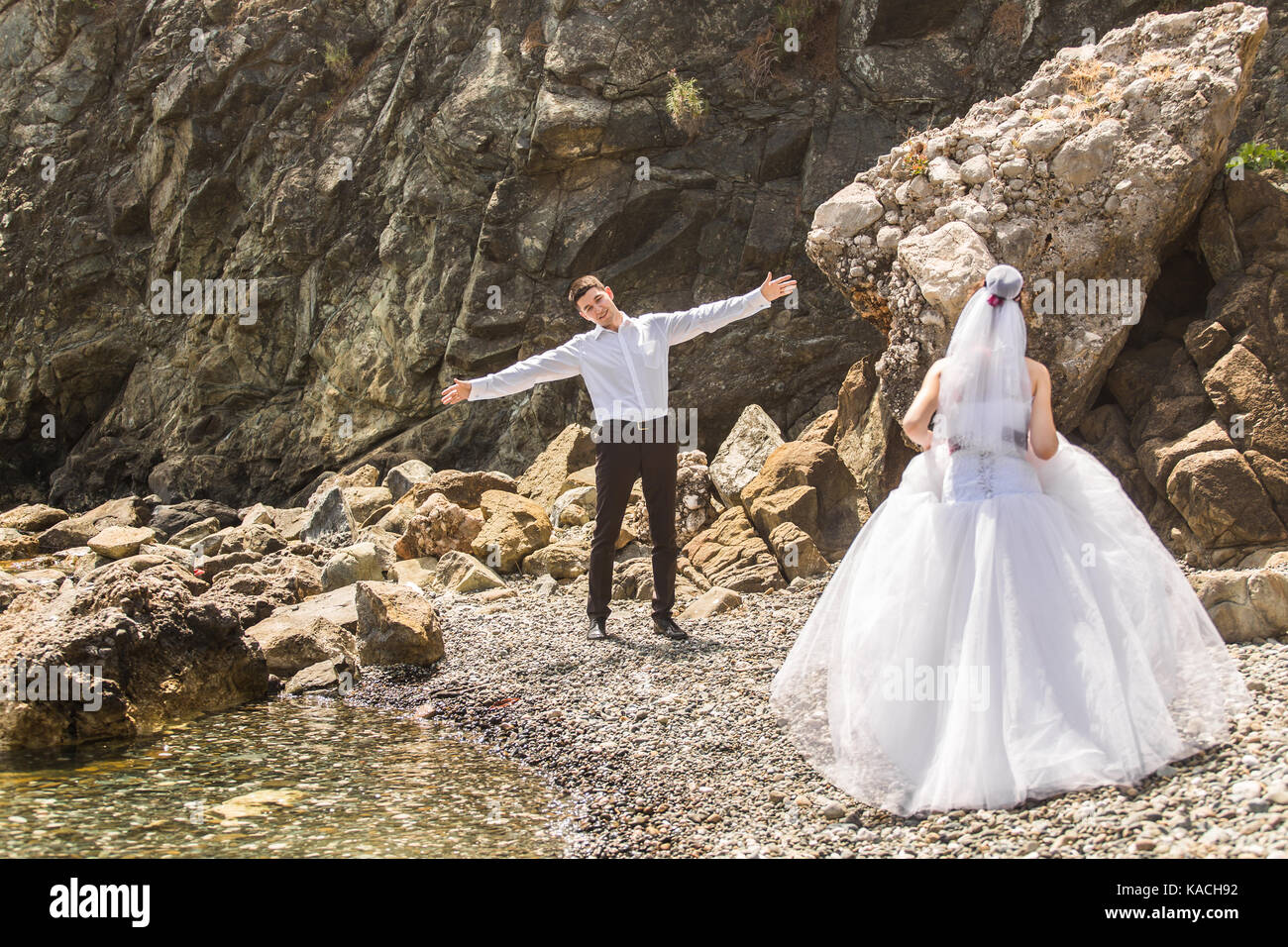 Groom and bride have fun at wedding day Stock Photo - Alamy
