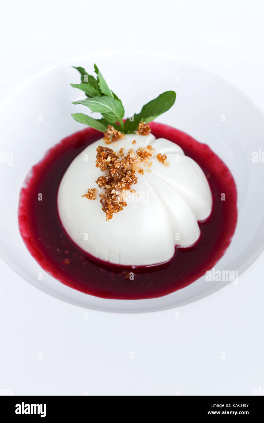 Fresh Panna Cotta on white plate Stock Photo - Alamy