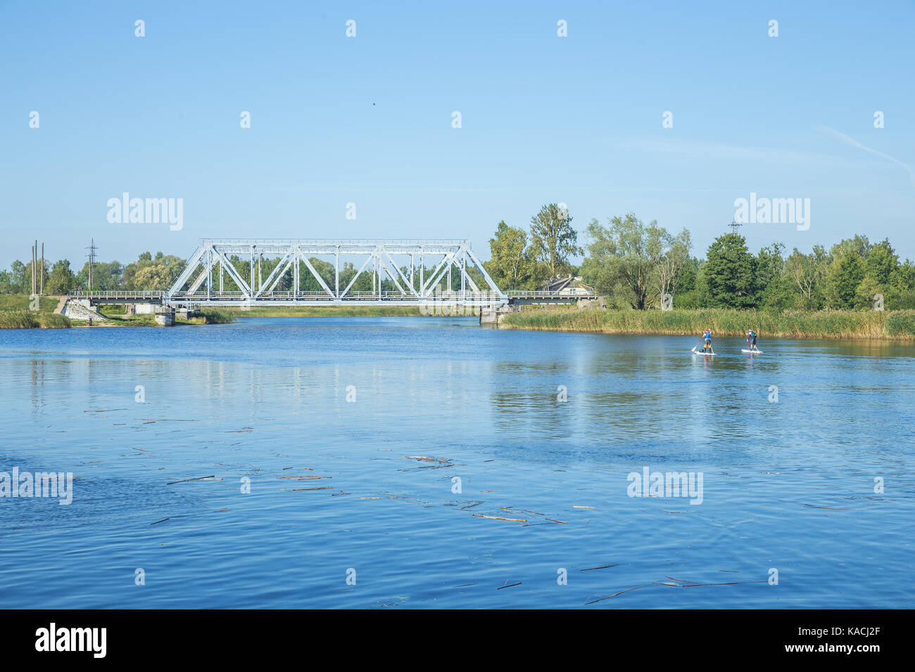 Latvia, Riga, Railway bridge, lake Jugla, SUP, peoples. 2017 Stock ...