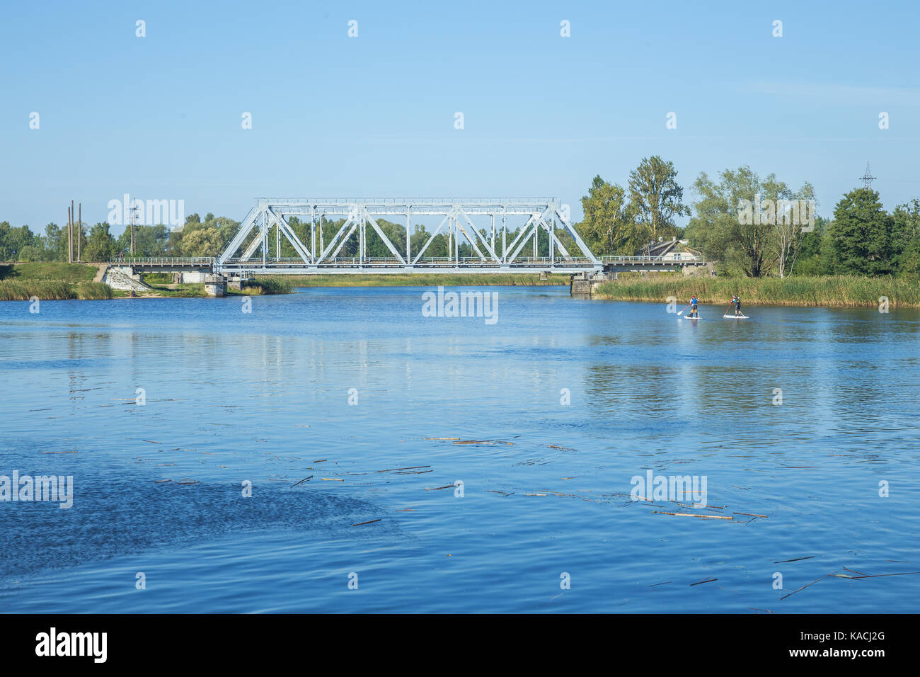 Latvia, Riga, Railway bridge, lake Jugla, SUP, peoples. 2017 Stock ...