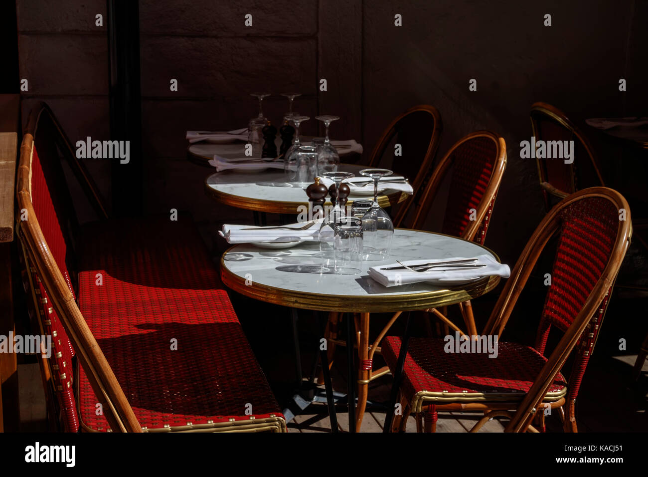 Served tables of street cafe urban city Stock Photo - Alamy