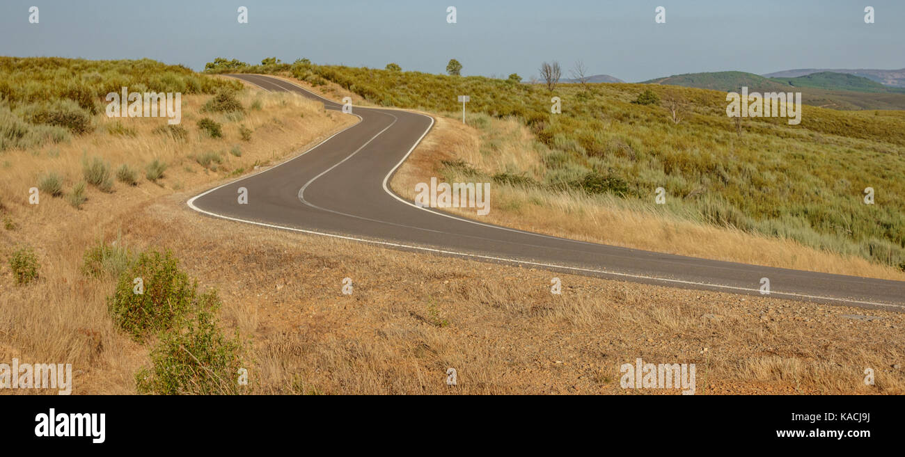 Curved road in the wild Stock Photo - Alamy