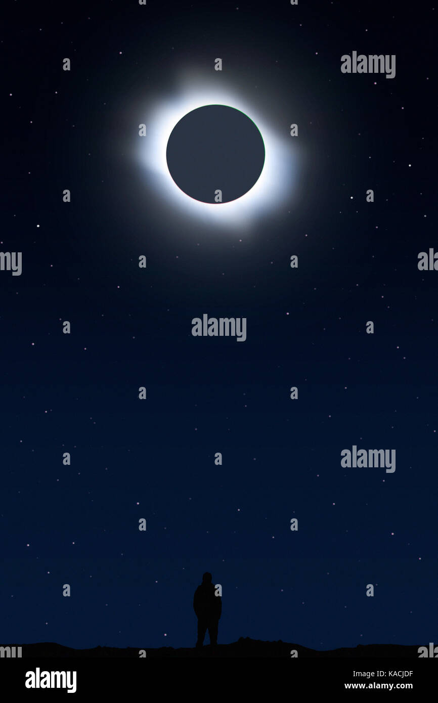 Man watching total eclipse during hiking Stock Photo - Alamy