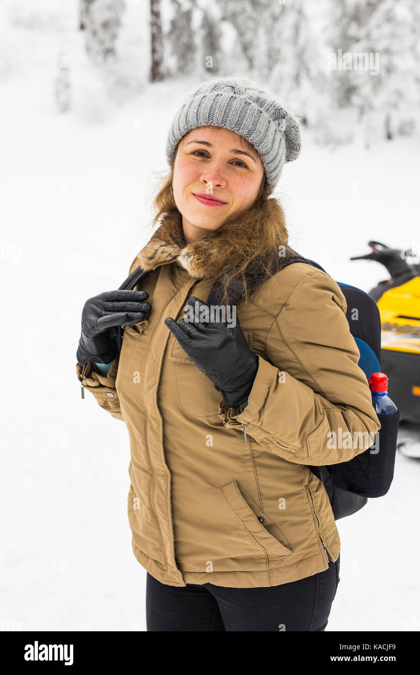 Happy girl on winter nature background. Winter, vacation, weekend and ...