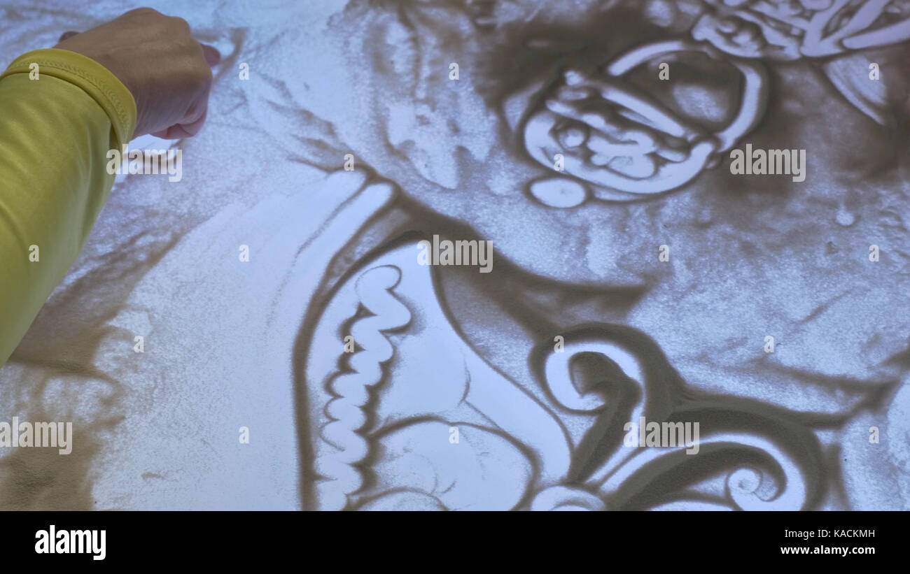 Sand painting. Abstract hand made background. Sand animation. Womans ...