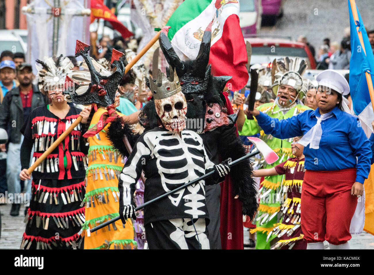 The skeleton king leads a procession through the historic city during ...