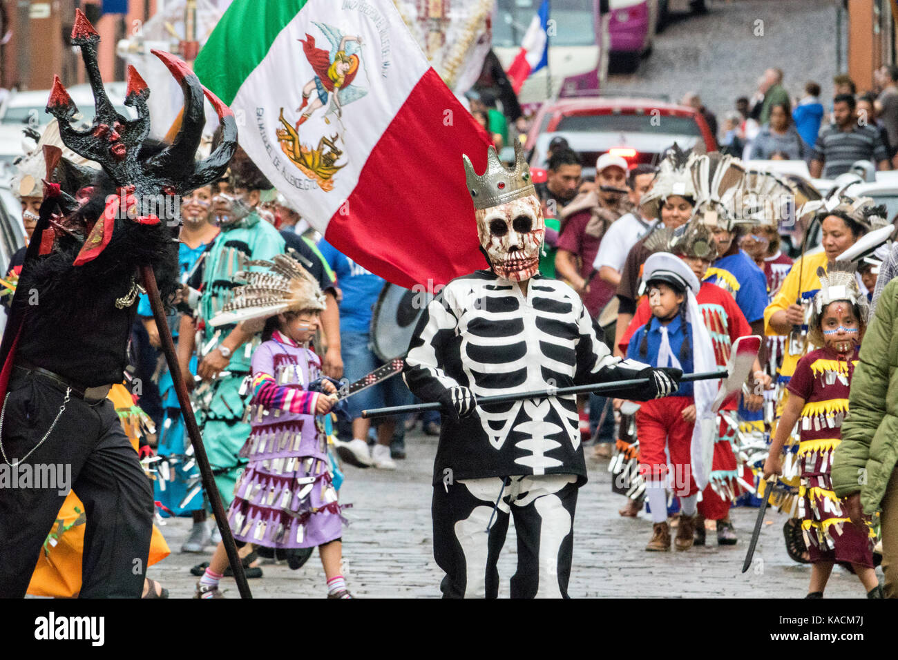 The skeleton king leads a procession through the historic city during ...