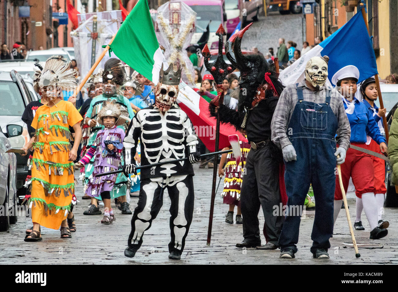 The skeleton king leads a procession through the historic city during ...
