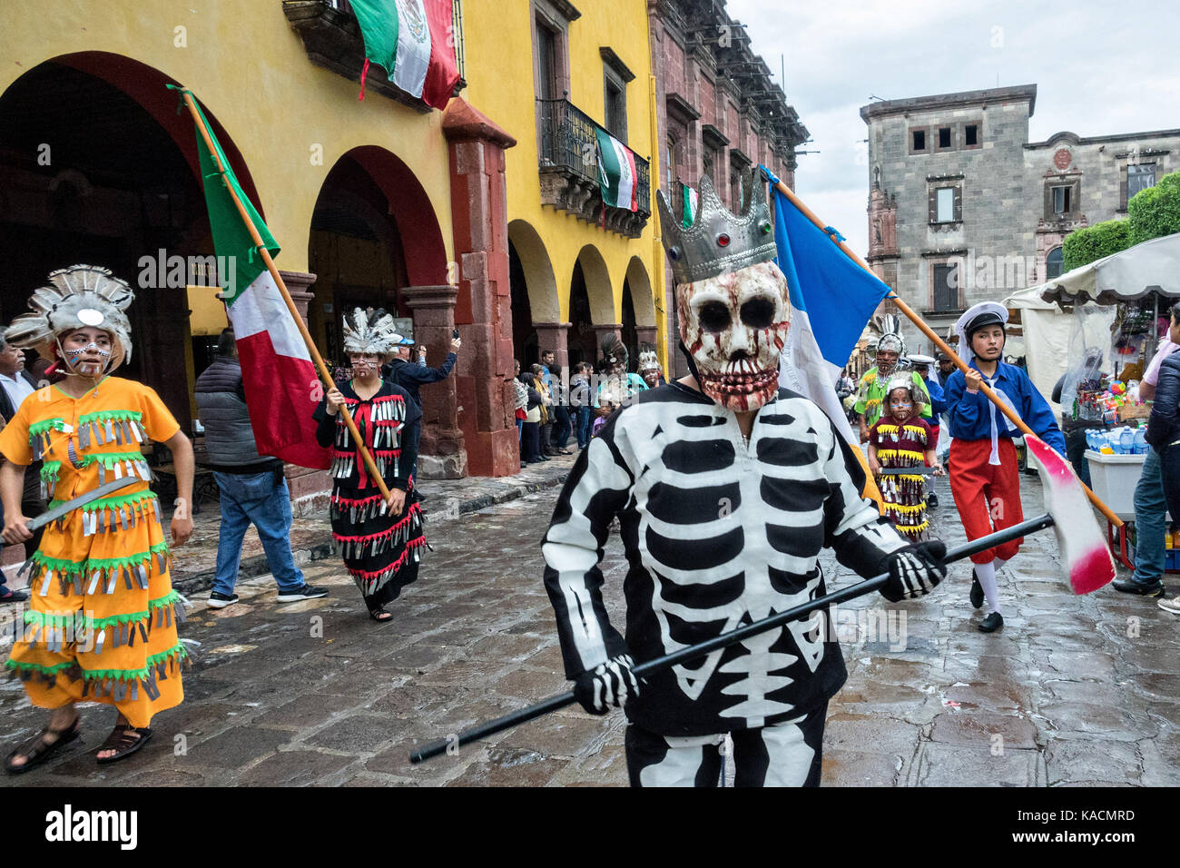 The skeleton king leads a procession through the Jardin Allende during ...