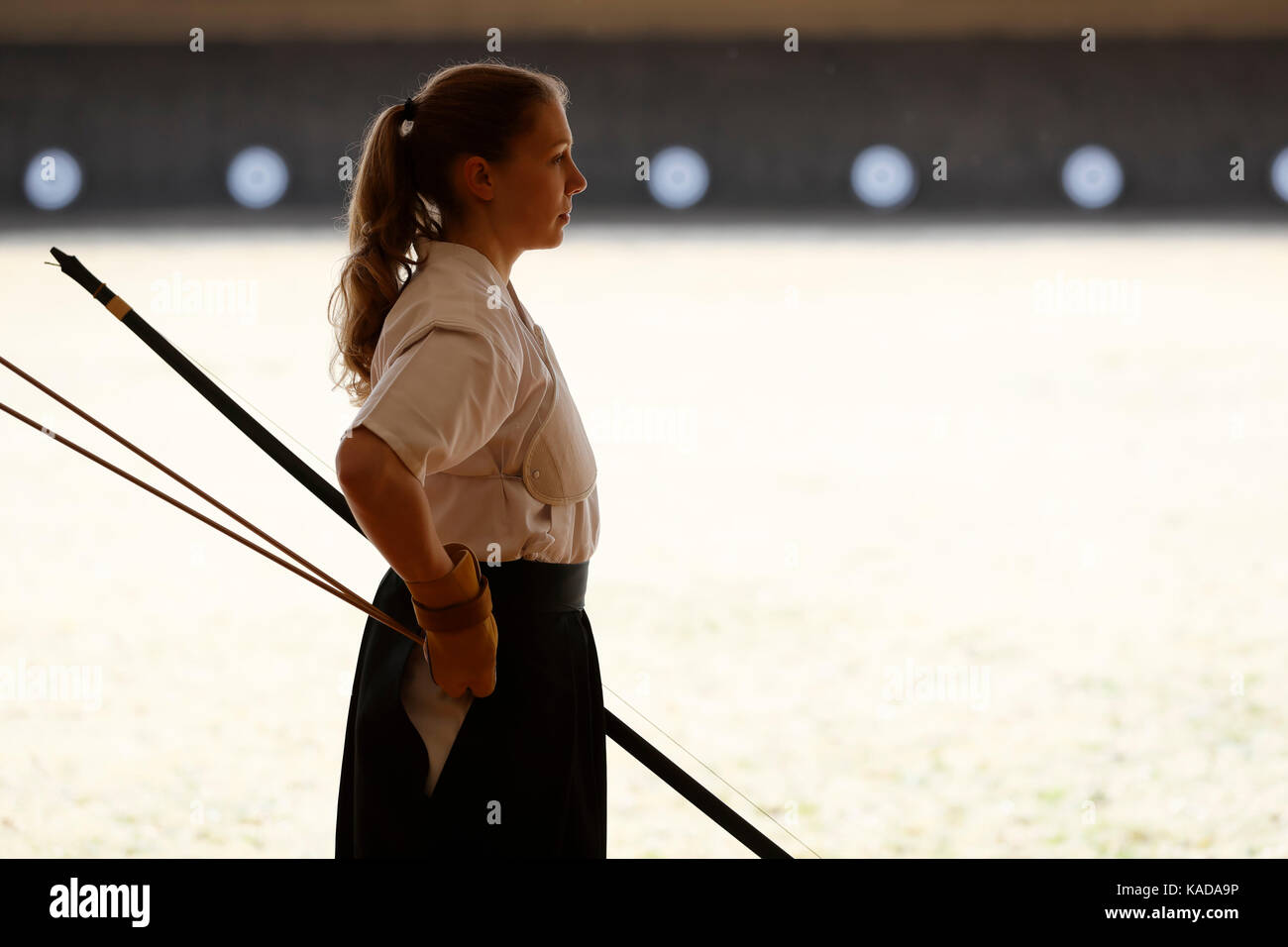 Caucasian woman practicing traditional Kyudo Japanese archery Stock ...