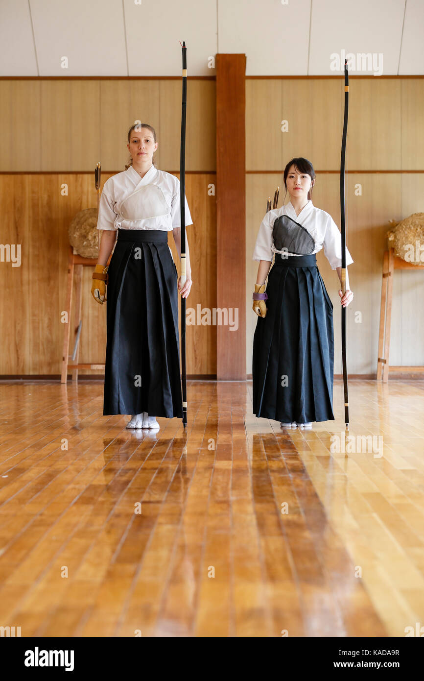 Multi-ethnic traditional Kyudo Japanese archery athletes Stock Photo ...
