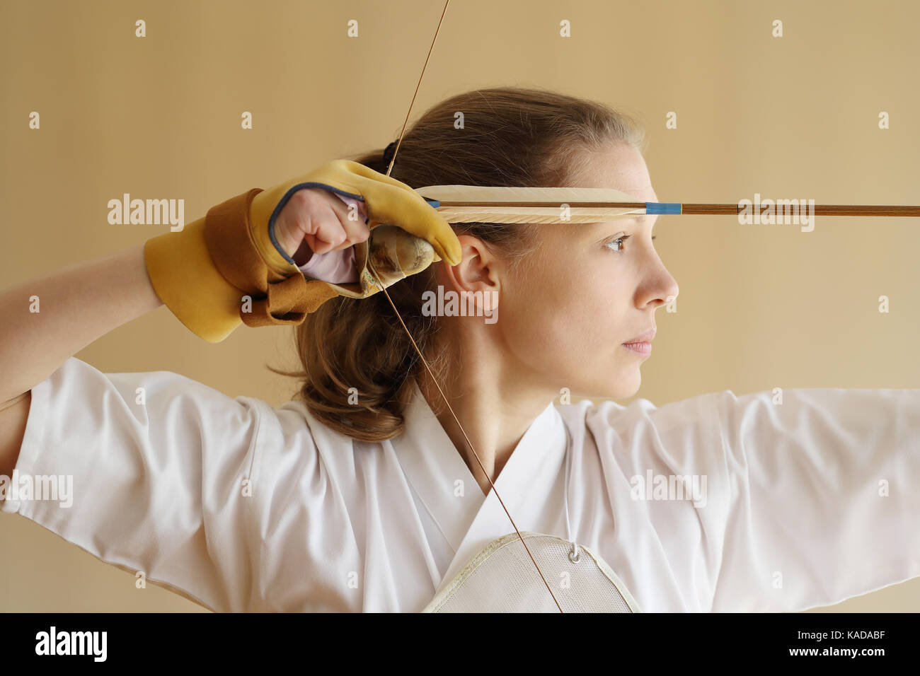 Caucasian woman practicing traditional Kyudo Japanese archery Stock ...