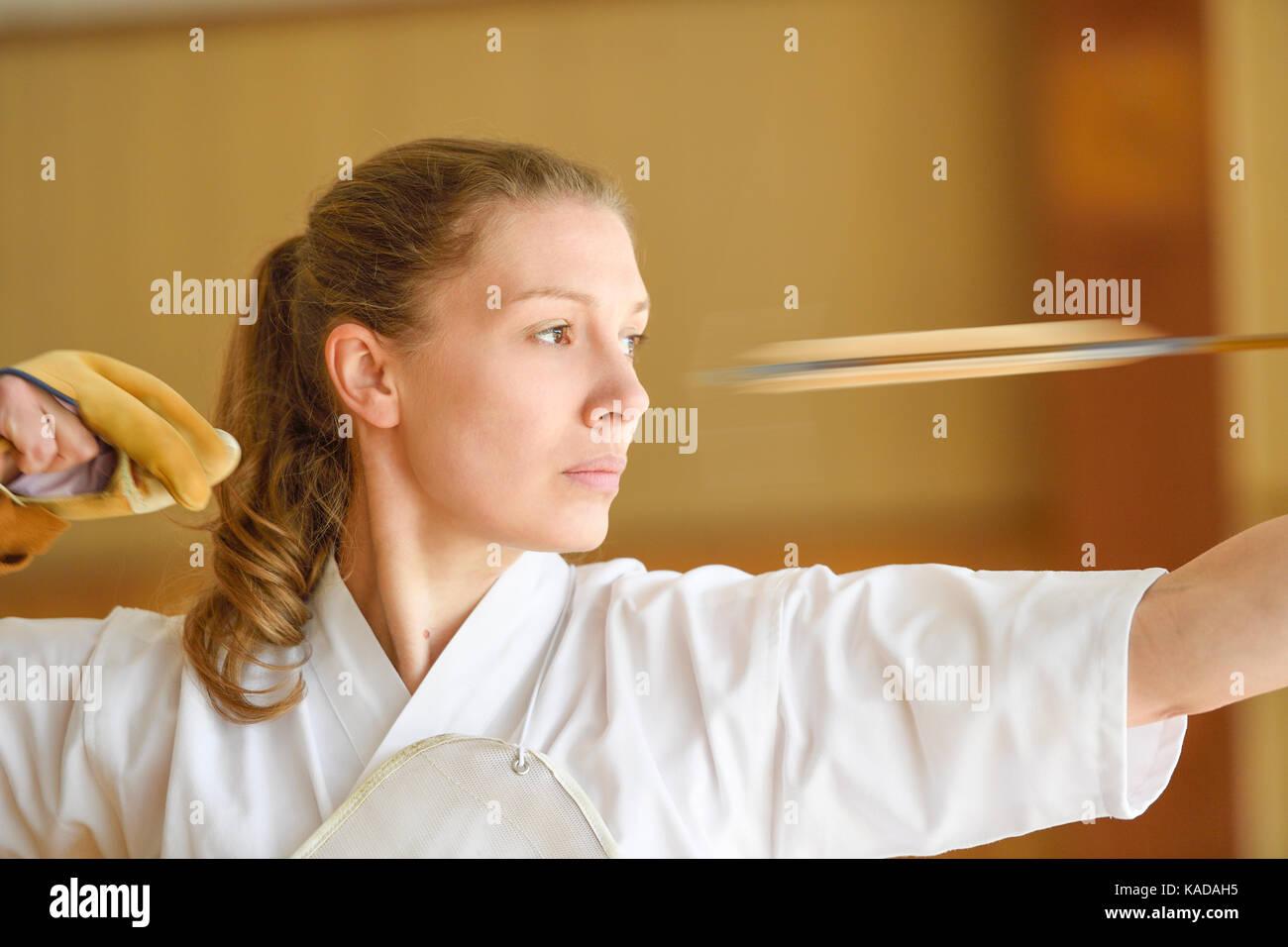 Caucasian woman practicing traditional Kyudo Japanese archery Stock ...