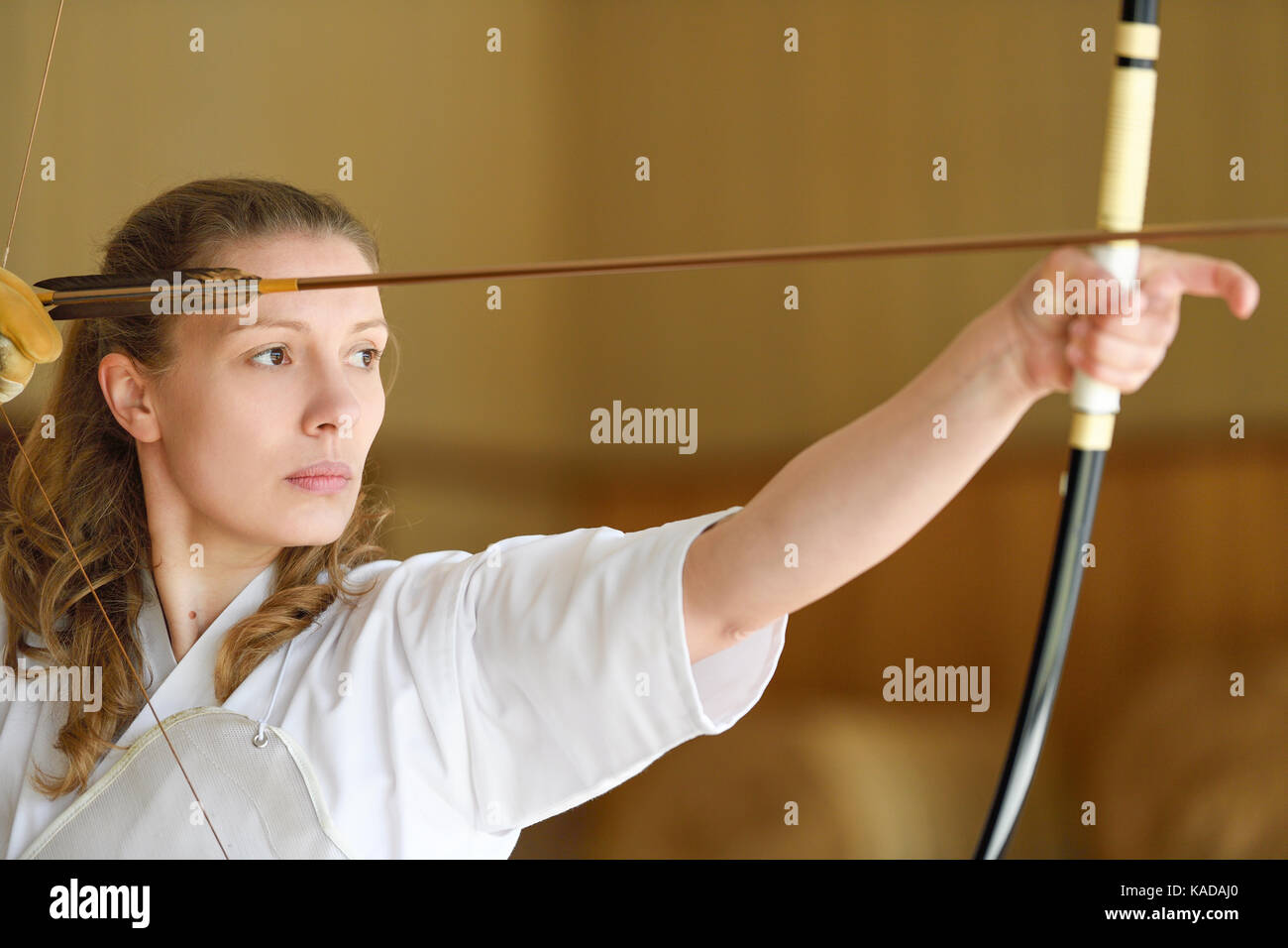 Caucasian woman practicing traditional Kyudo Japanese archery Stock ...