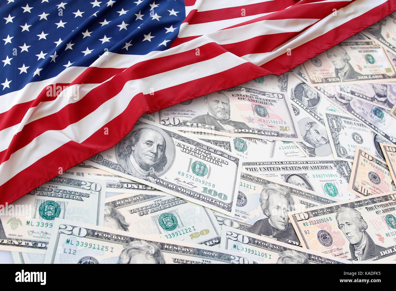 American flag on assorted banknotes Stock Photo - Alamy