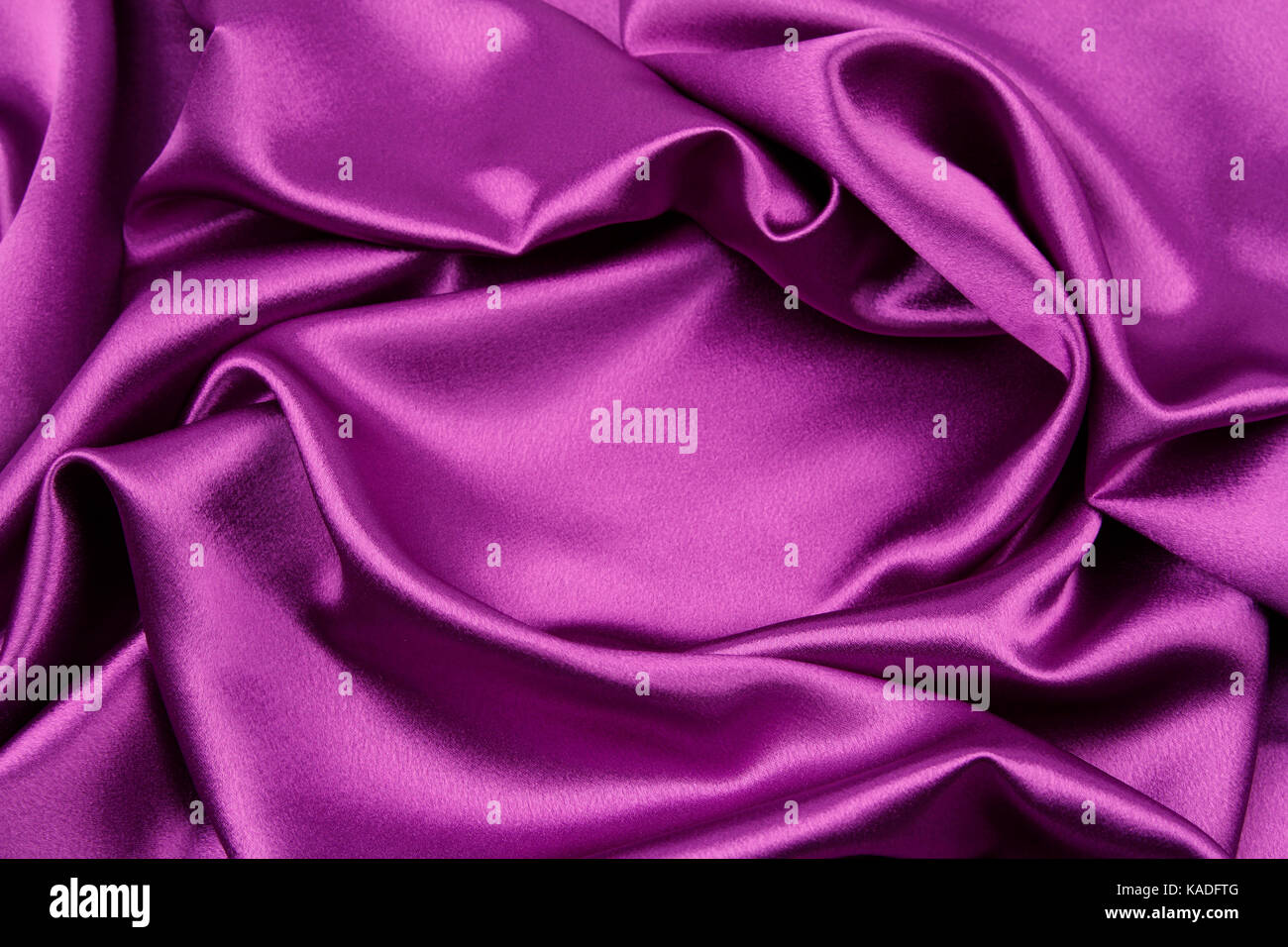 Closeup of rippled purple silk fabric Stock Photo - Alamy