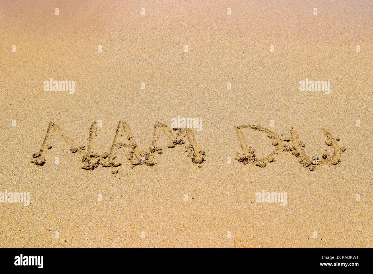 Alphabet writing on sand letter hi-res stock photography and images - Alamy