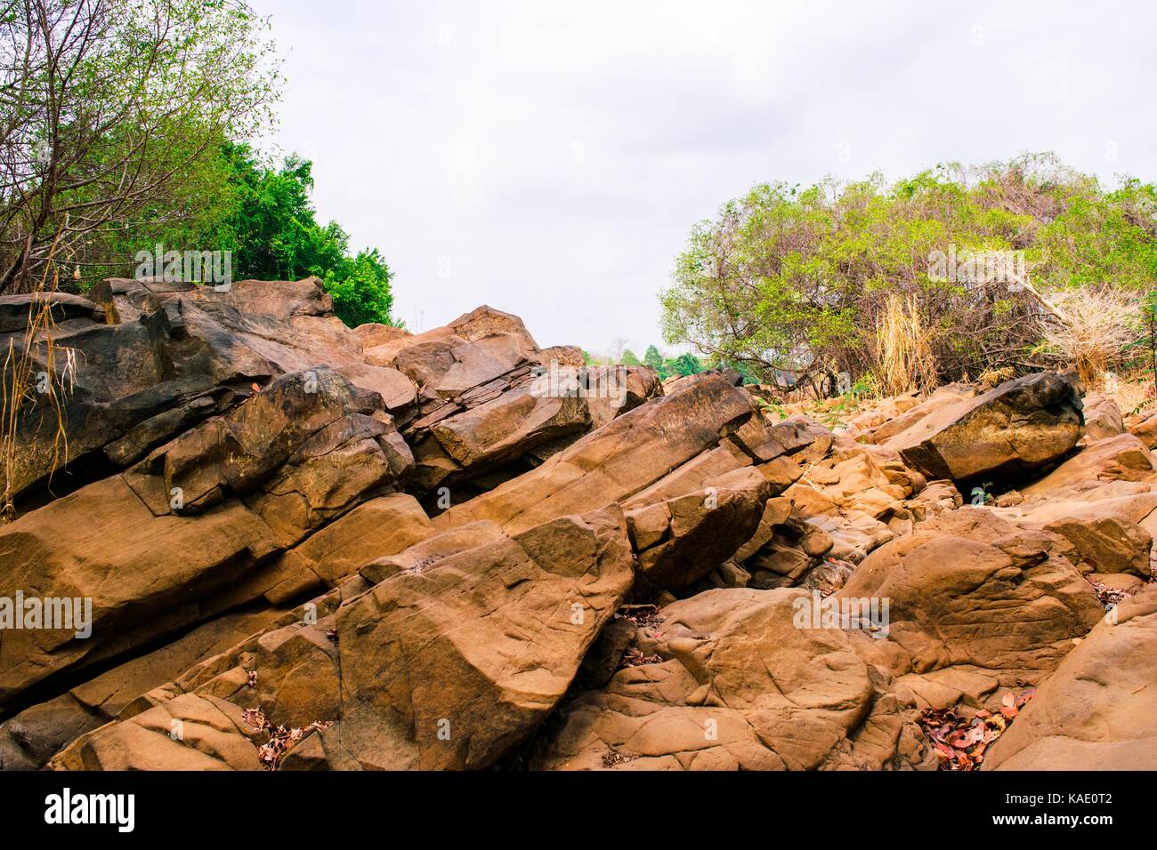 coastal red rocks Stock Photo - Alamy