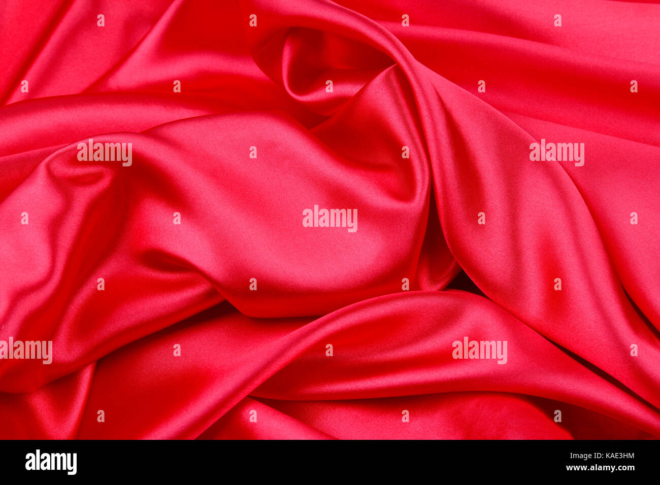 Closeup of ripples in red silk fabric Stock Photo - Alamy
