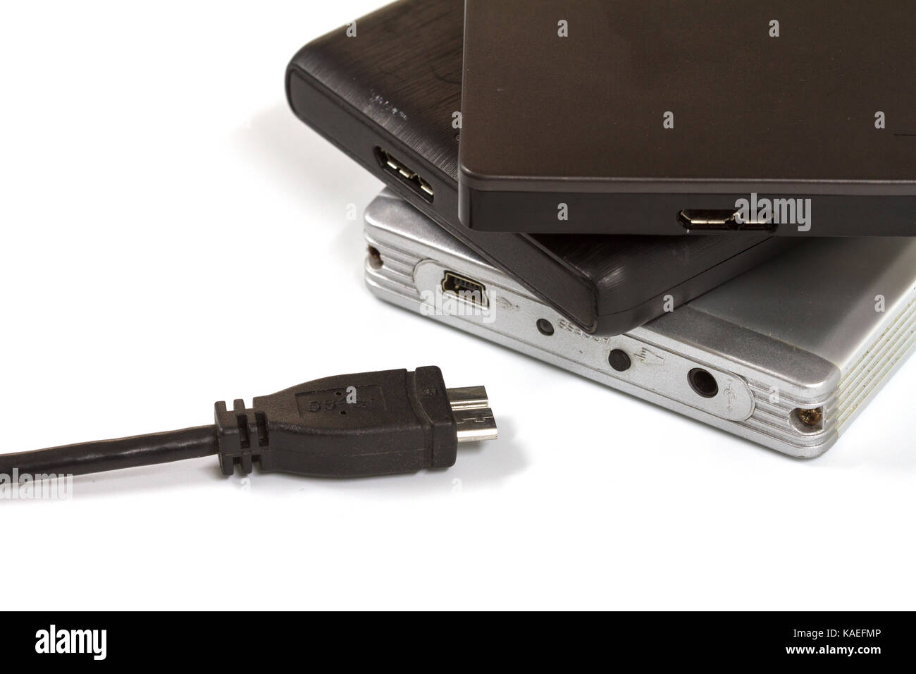 External hard drive with usb cable on white Stock Photo - Alamy