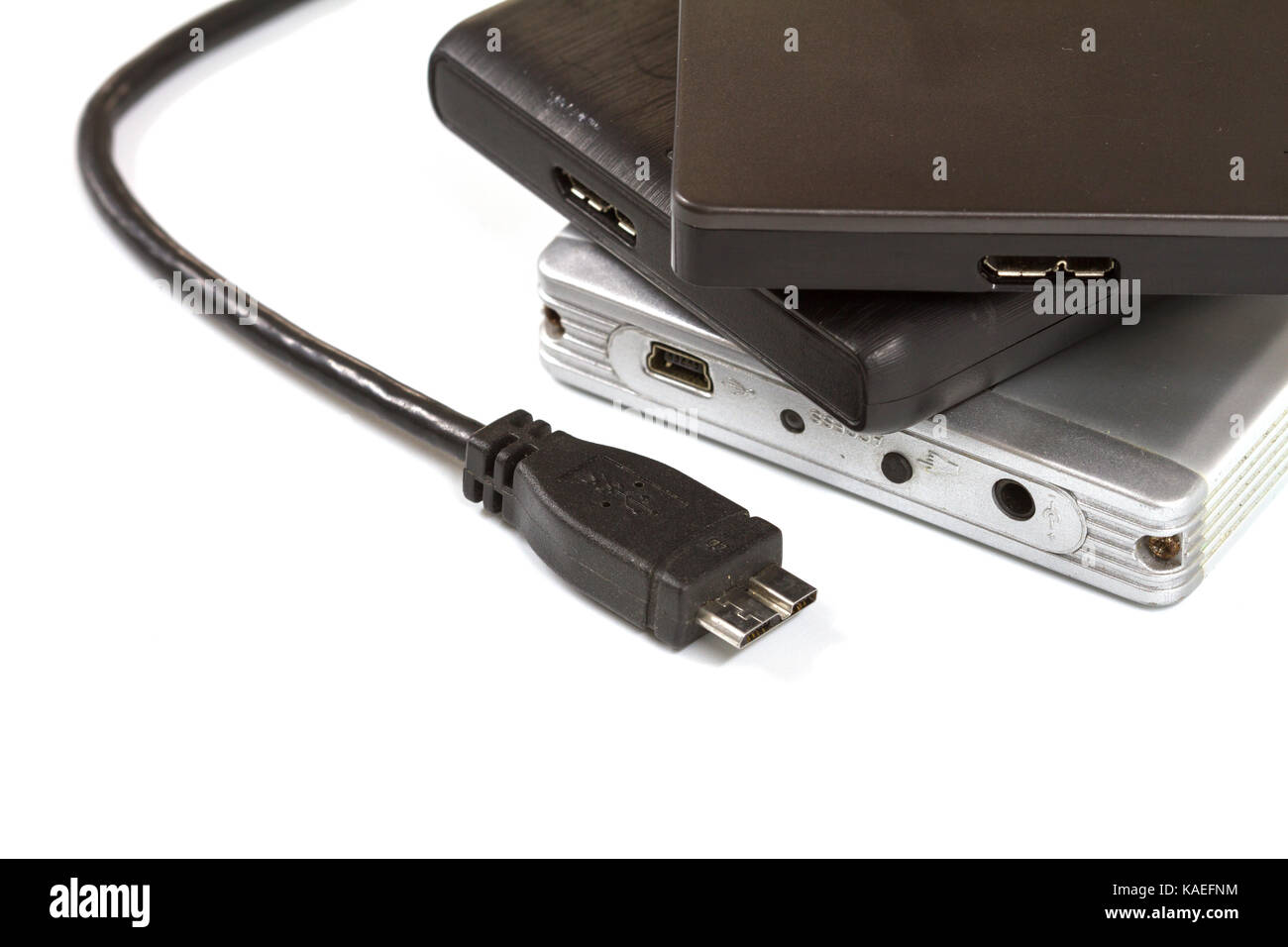 External hard drive with usb cable on white Stock Photo - Alamy