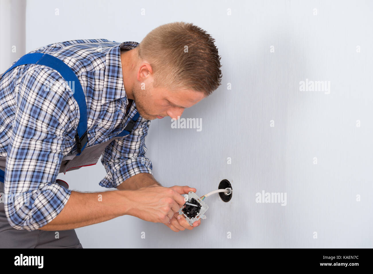 Installing socket hi-res stock photography and images - Alamy