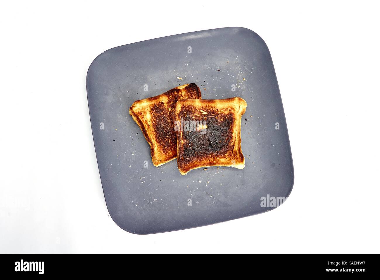 A studio photo of burnt toast Stock Photo - Alamy