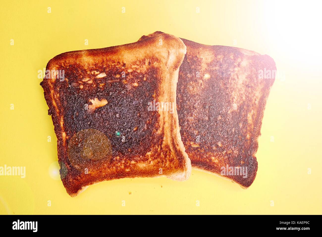 A studio photo of burnt toast Stock Photo - Alamy