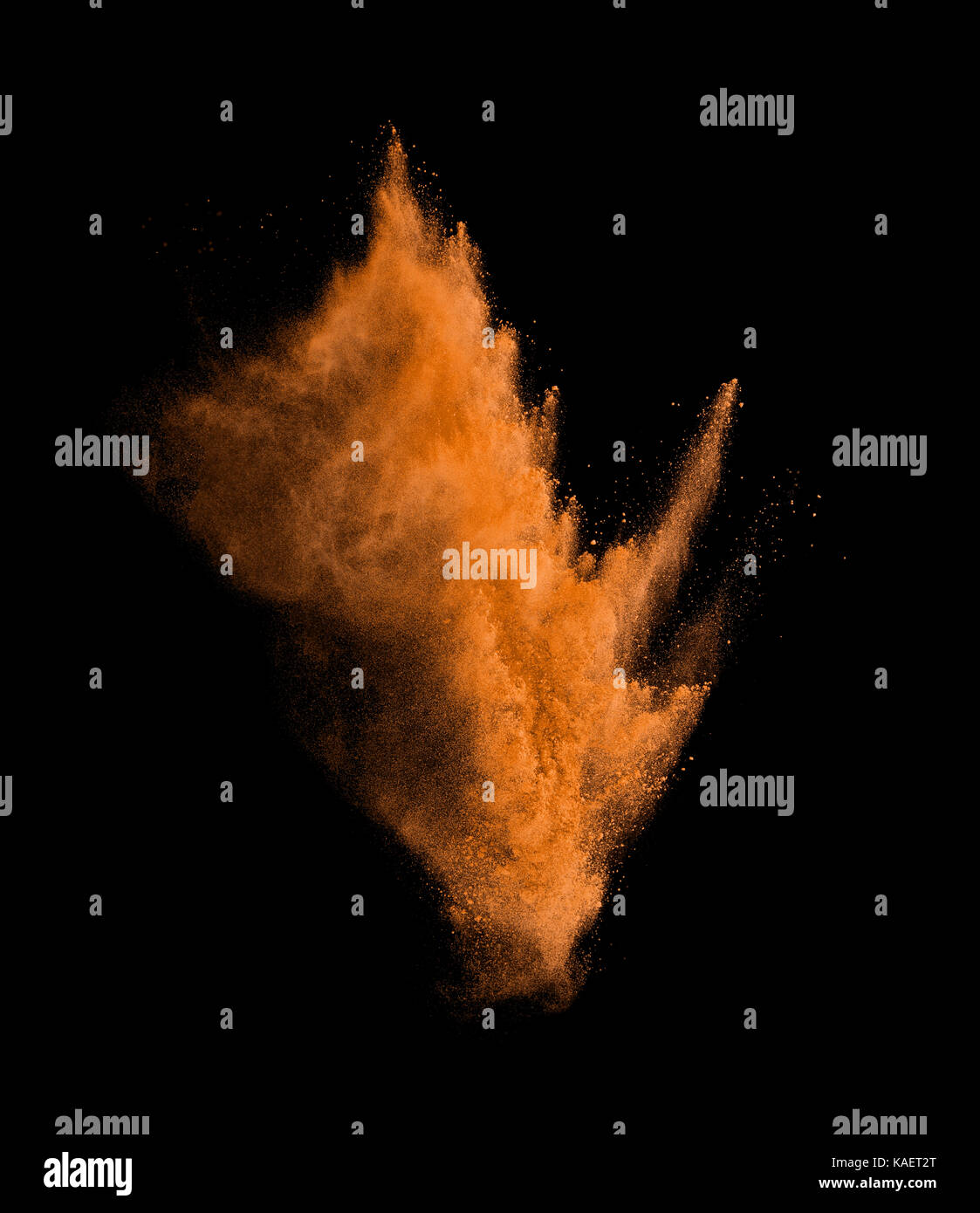 Orange colorful powder splash on black background Stock Photo - Alamy