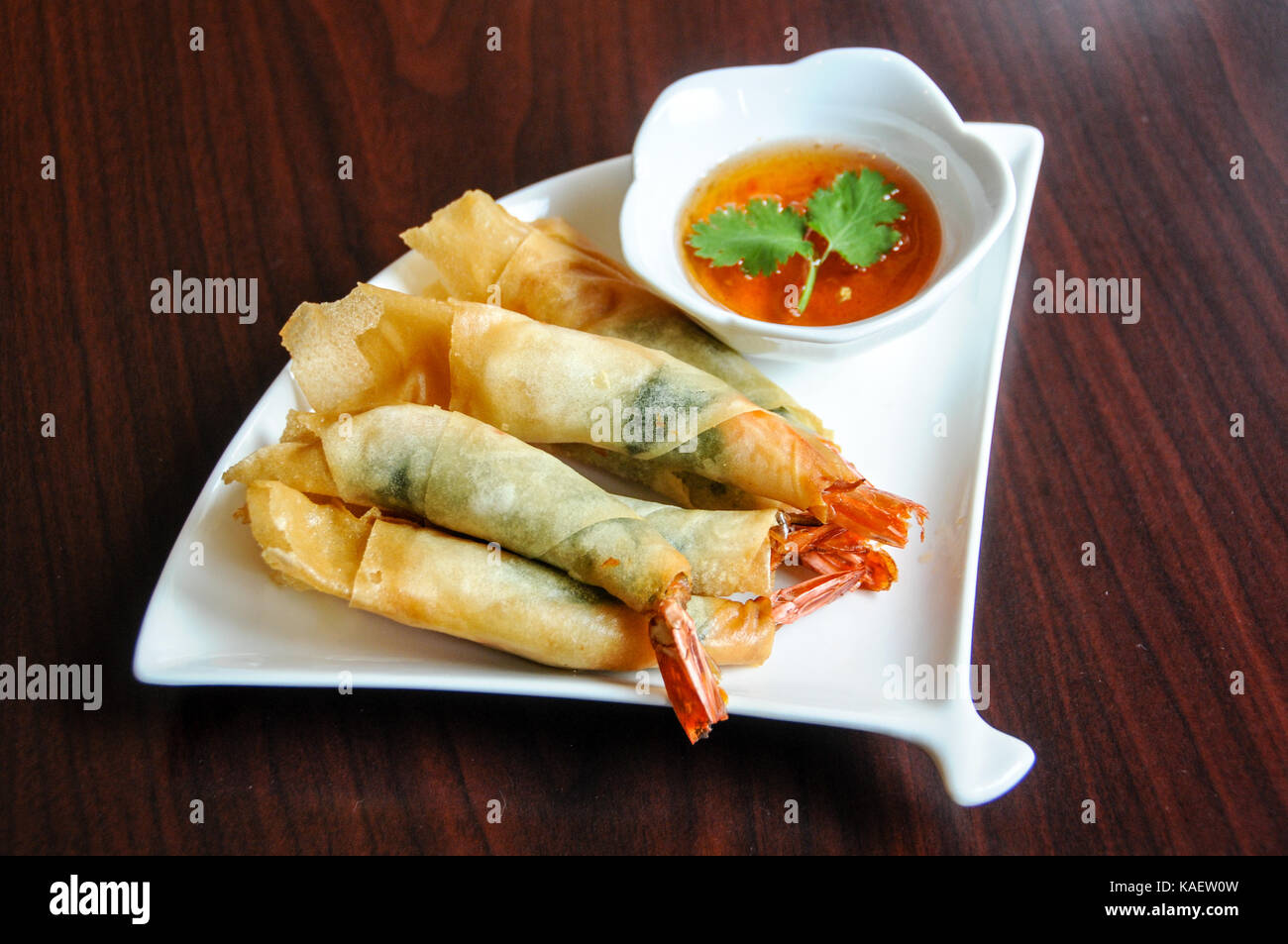 Shrimp Rolls, Whole shrimp rolled with basil leaves in a crispy rice ...
