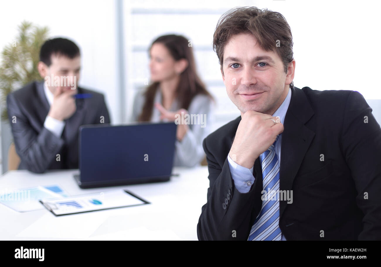 successful businessman in the workplace Stock Photo - Alamy