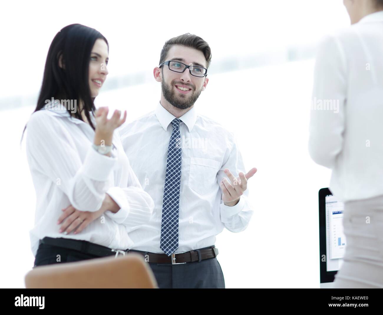 company employees are talking in the office Stock Photo - Alamy