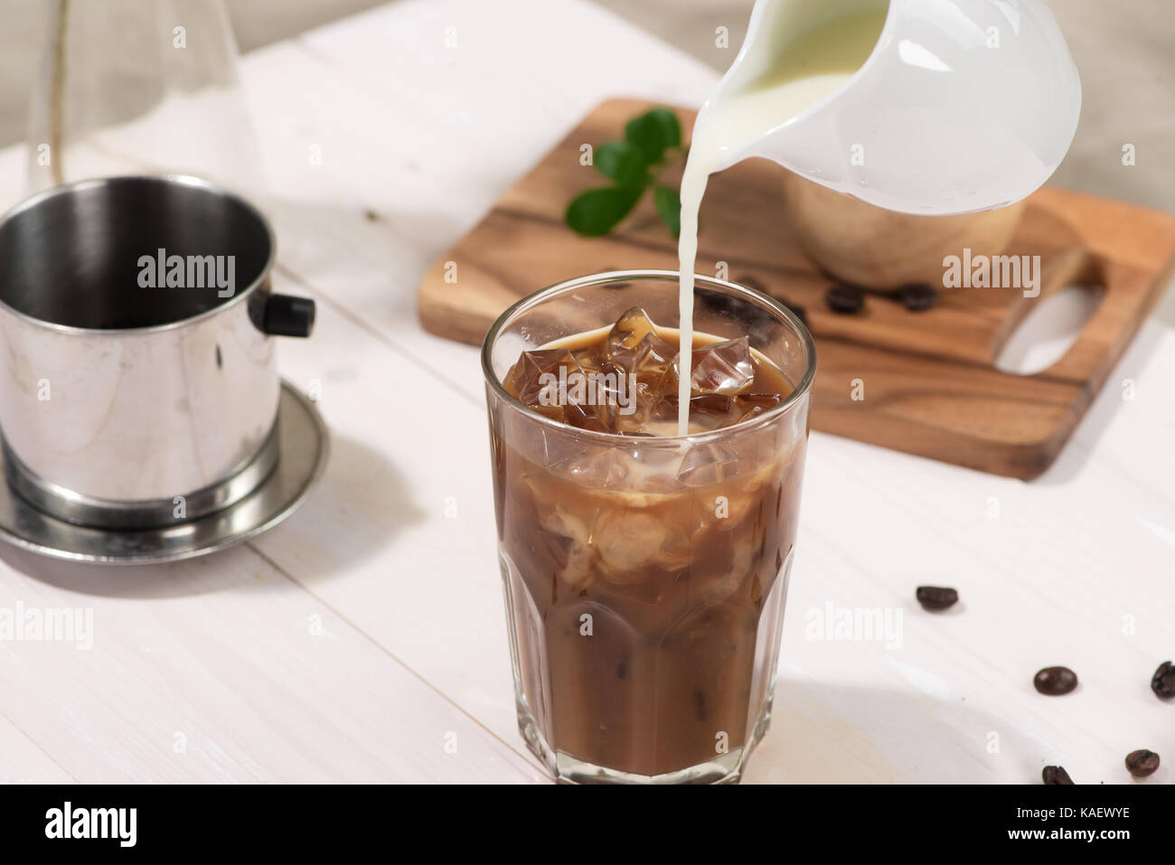 Barista pours milk coffee hi-res stock photography and images - Alamy