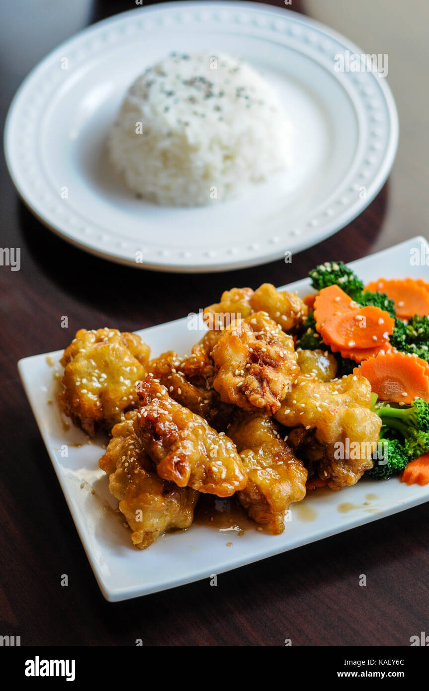 Sesame Chicken, Lightly breaded chicken with broccoli, carrots and ...