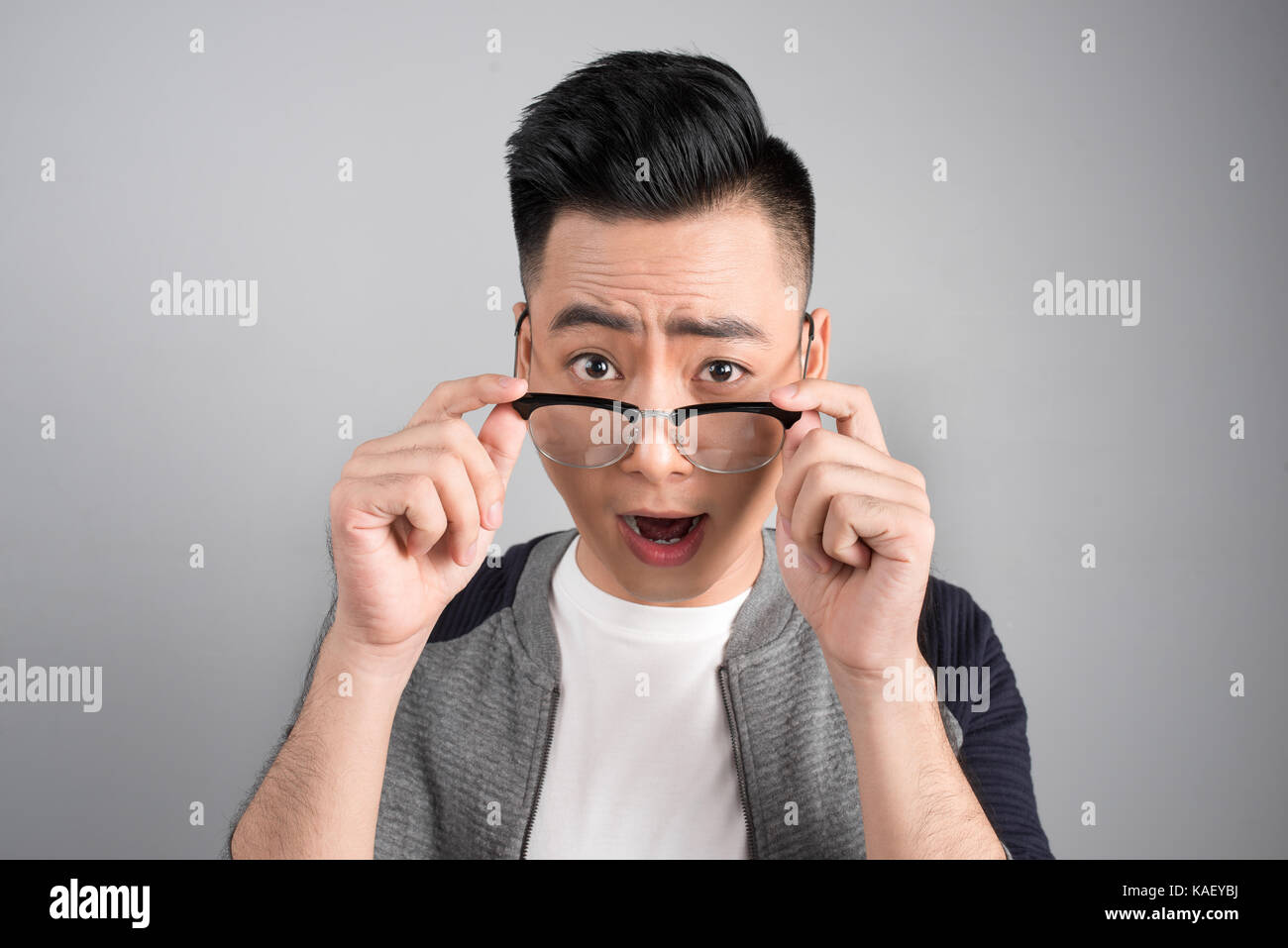 A portrait of asian man with surprised emotion face Stock Photo - Alamy