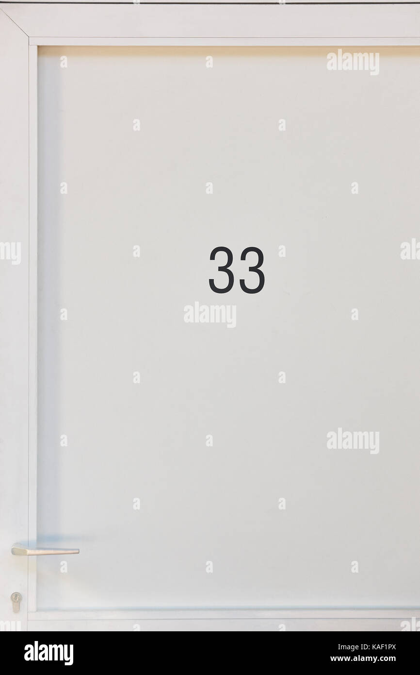 White motel room detail with number. Tourist apartment. Vacation ...