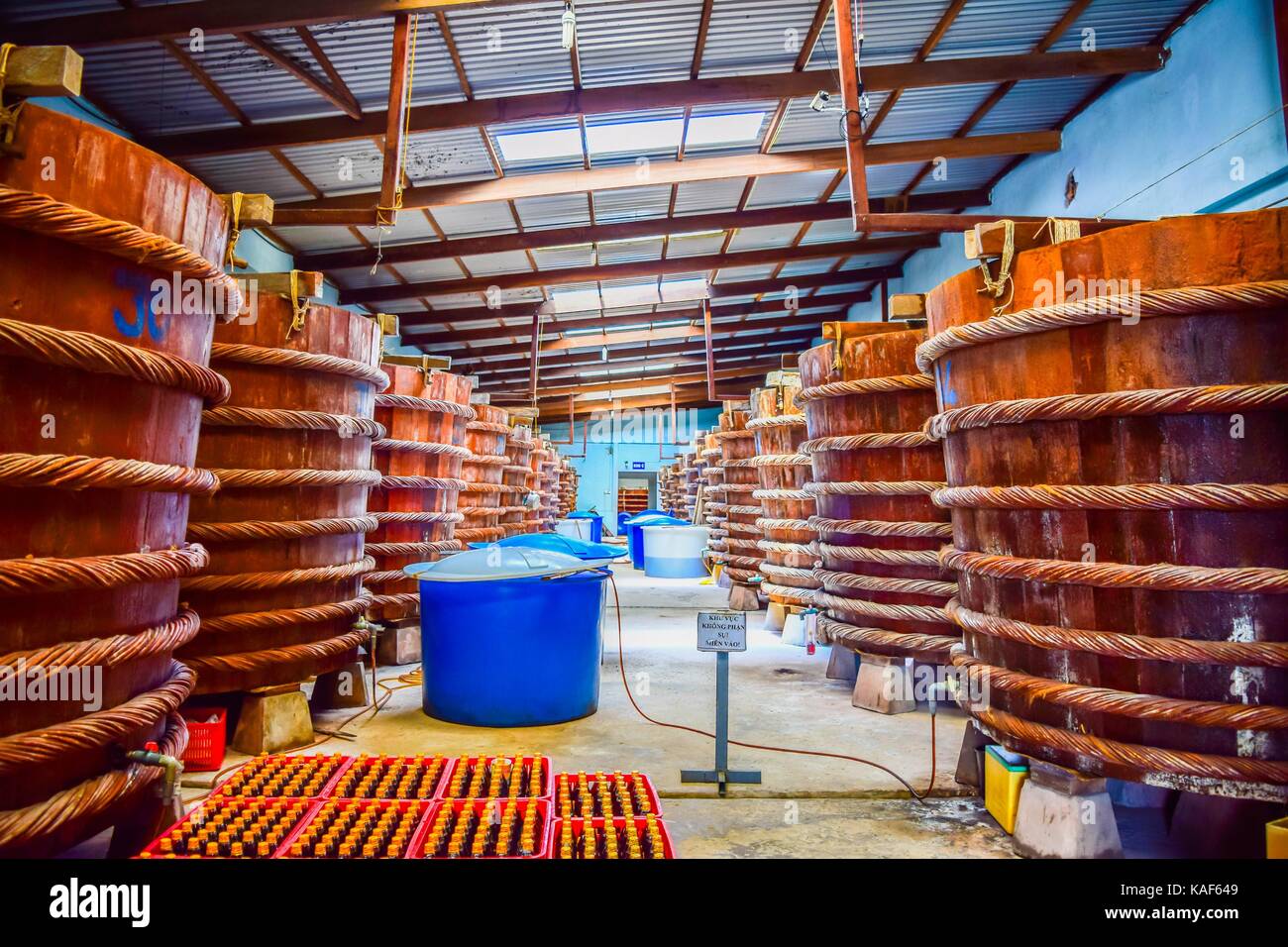 Fish sauce tanks Stock Photo - Alamy