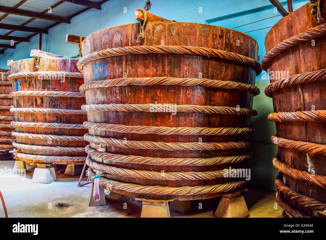 Fish sauce tanks Stock Photo - Alamy