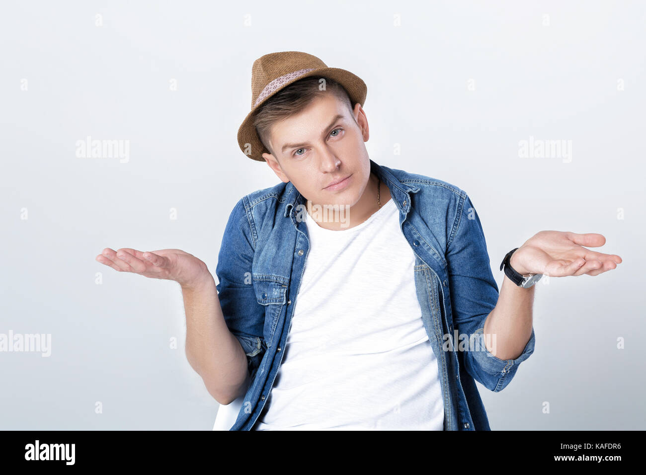handsome man in denim with hat Stock Photo - Alamy