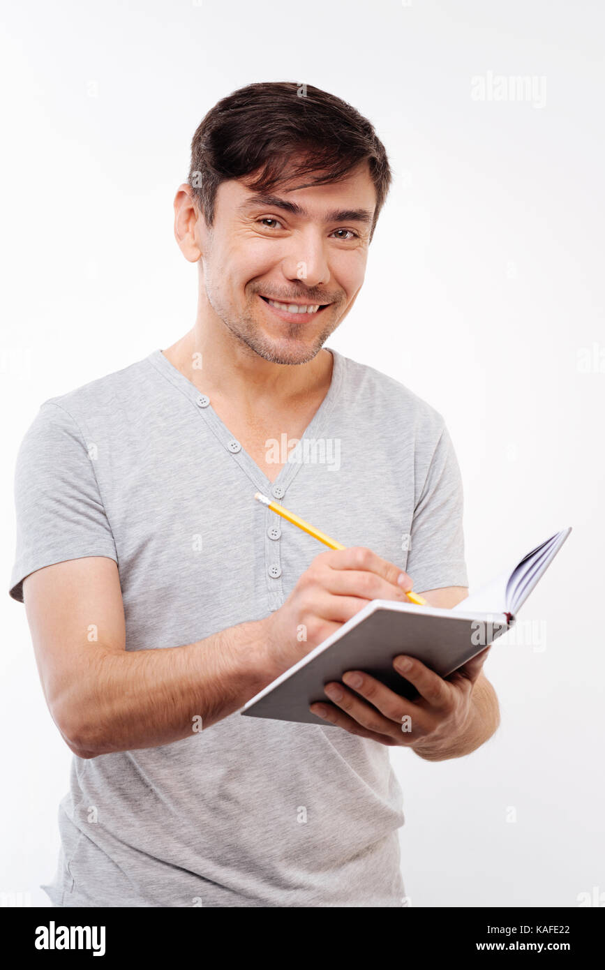 Pleasant man making notes hi-res stock photography and images - Alamy