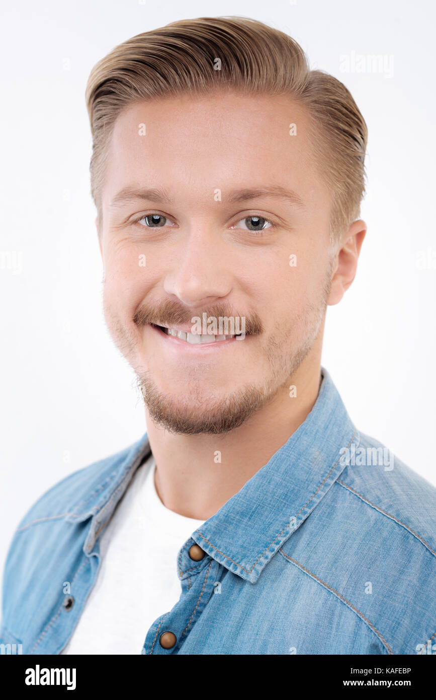 Portrait of fair-haired charming young man Stock Photo - Alamy